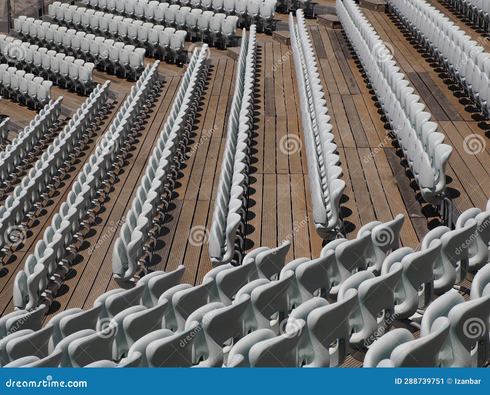 Rows of Numbered Empty Plastic Seats at an Open-air Amphitheater. Many ...