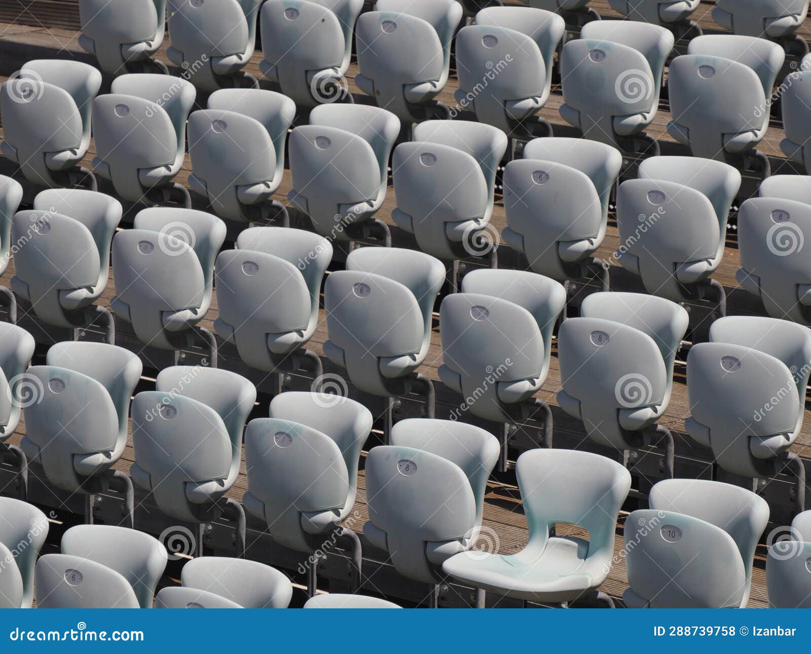 Rows of Numbered Empty Plastic Seats at an Open-air Amphitheater. Many ...