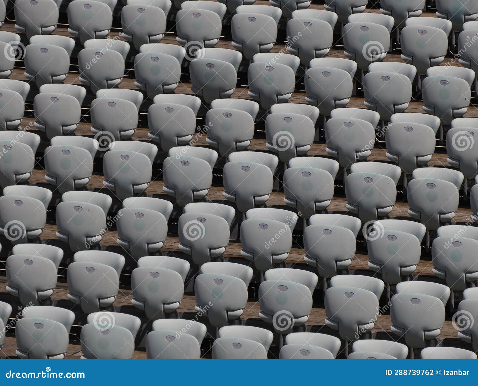 Rows of Numbered Empty Plastic Seats at an Open-air Amphitheater. Many ...