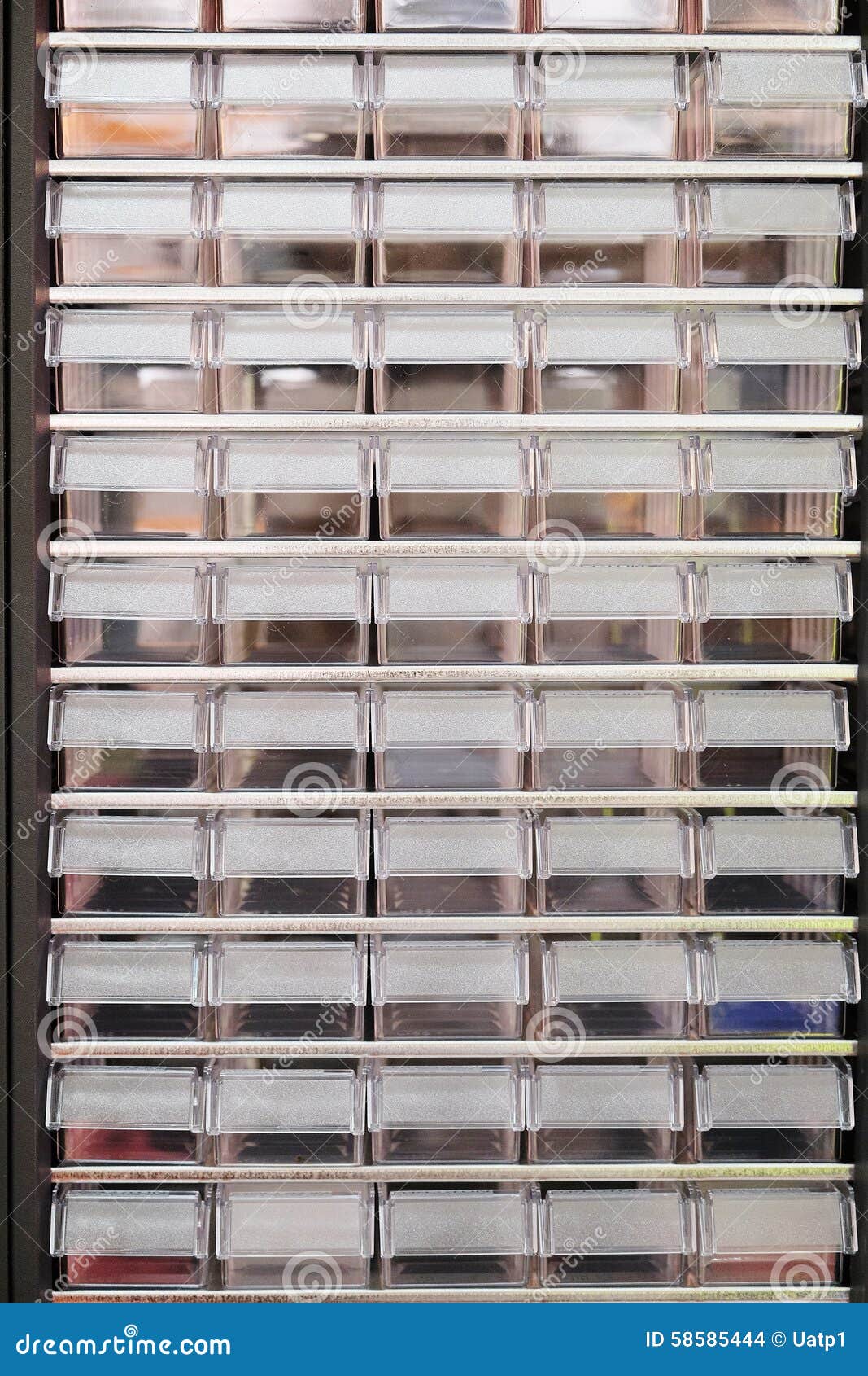 Rows of plastic boxes stock photo. Image of storage, parts - 58585444