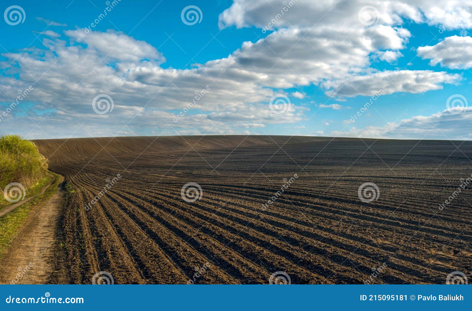 Rows of Plowed Field in Spring Under a Beautiful Sky Stock Image ...