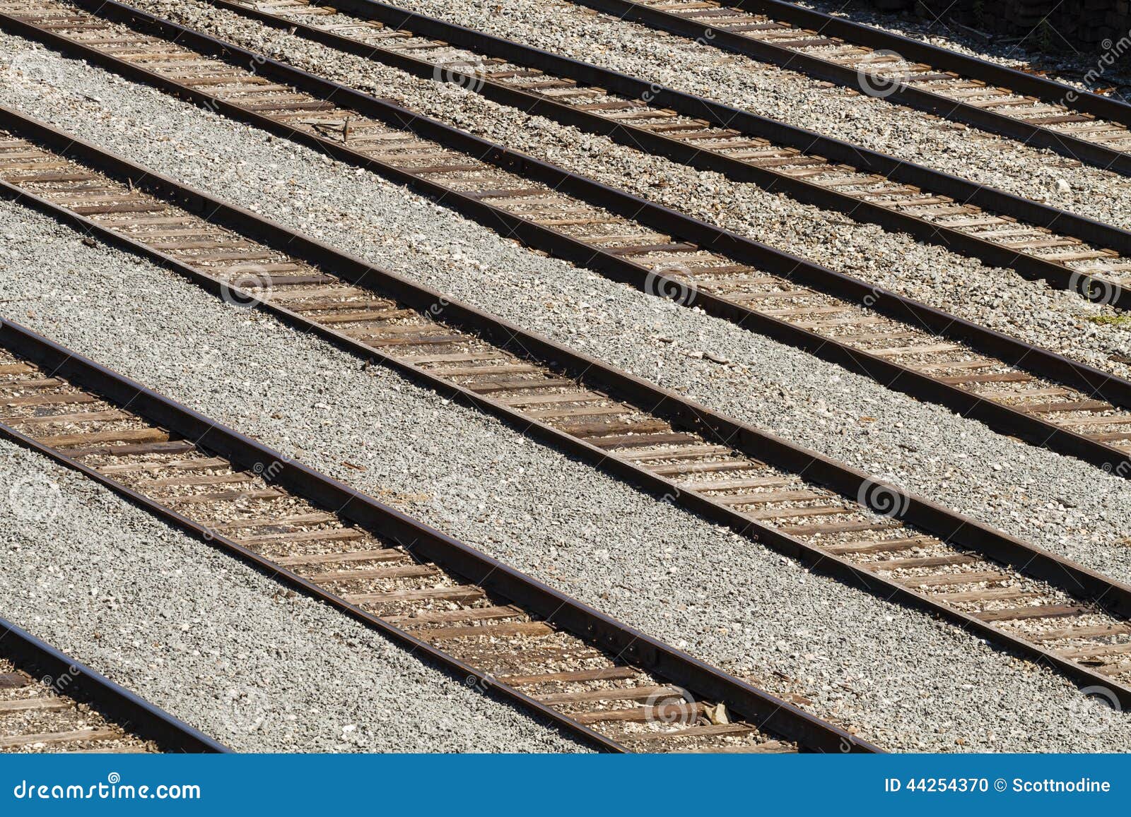 Rows of Railroad Tracks in a Train Yard Stock Photo - Image of orange ...
