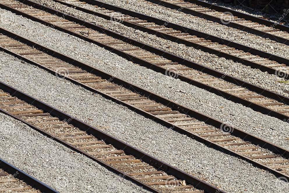 Rows of Railroad Tracks in a Train Yard Stock Photo - Image of orange ...