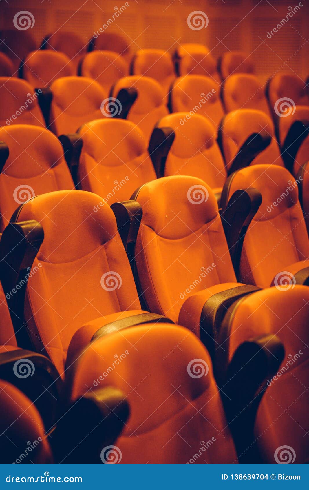 Rows of red seats stock photo. Image of indoor, event - 138639704