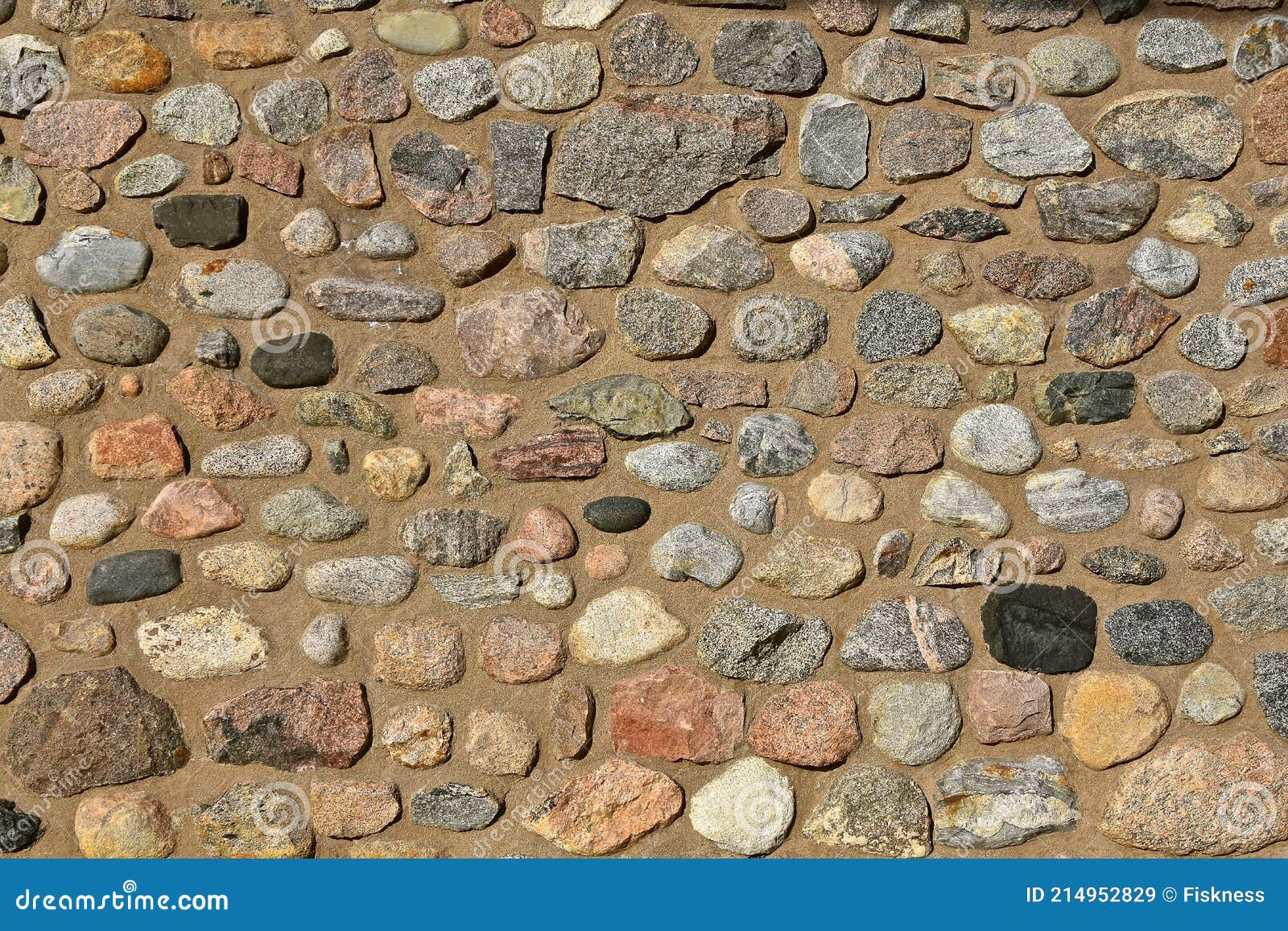 Rows of Rocks Set in Concrete Wall Stock Image - Image of pattern ...