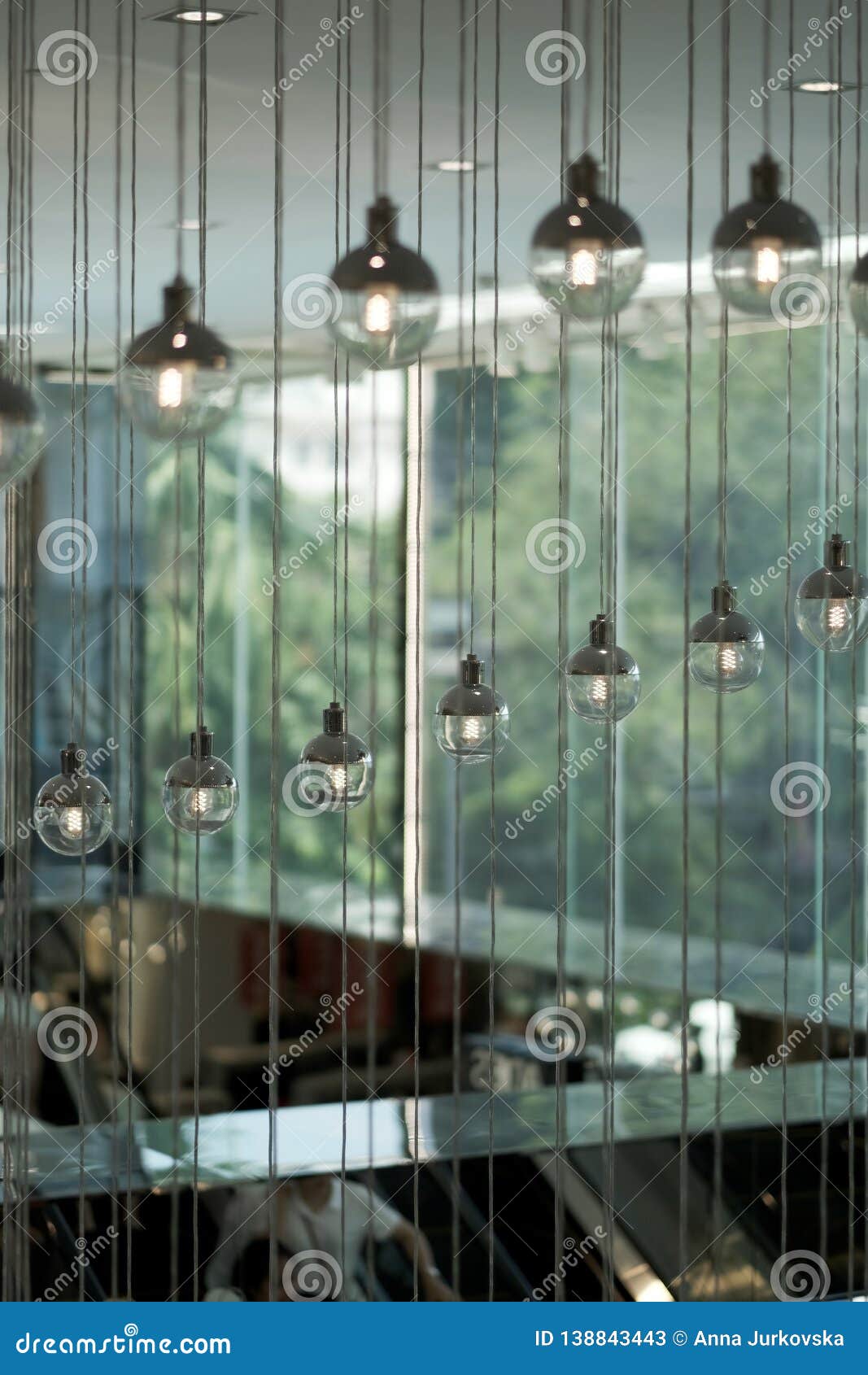 Rows of Round Decorative Lights Suspended from the Ceiling Stock Image ...