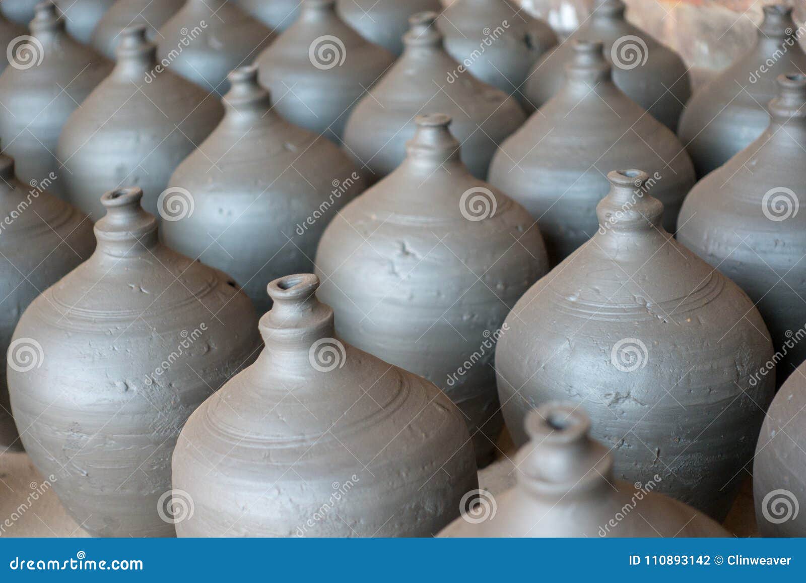 Rows of Drying Pottery stock photo. Image of pottery - 110893142
