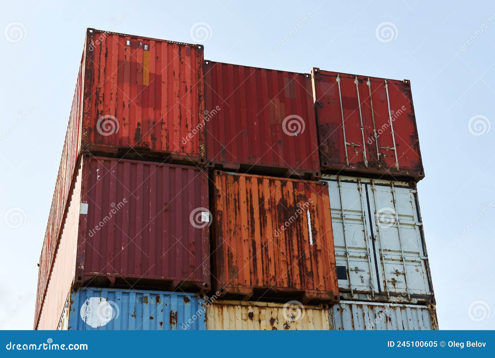 Rows of Rusty Shipping Containers on the Background of Blue Sky Stock ...