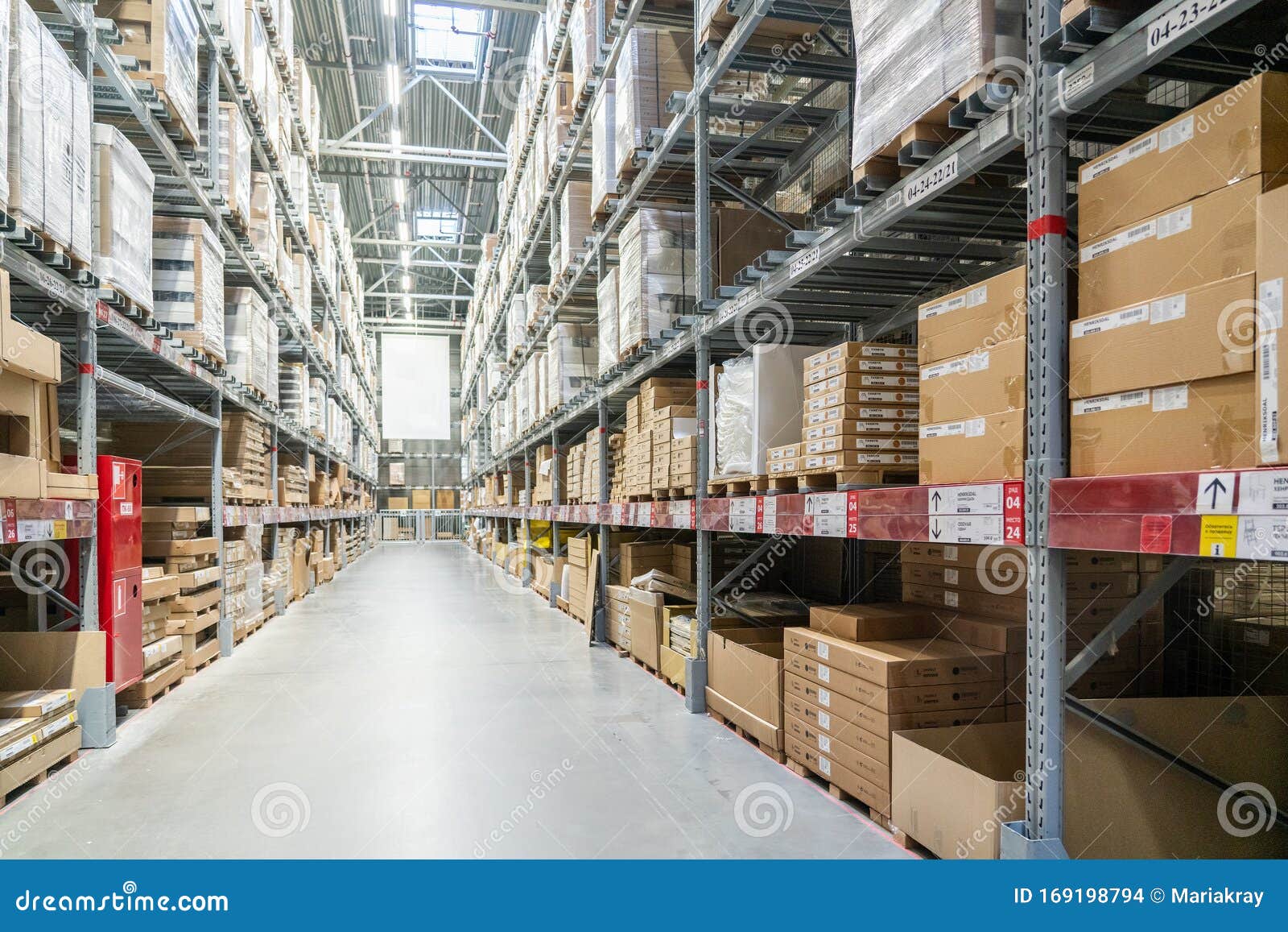 Rows of Shelves with Boxes in Modern Warehouse Editorial Stock Image ...