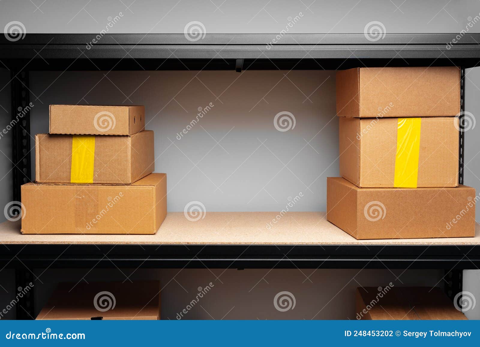 Rows of Shelves with Cardboard Boxes in Modern Warehouse Stock Photo ...
