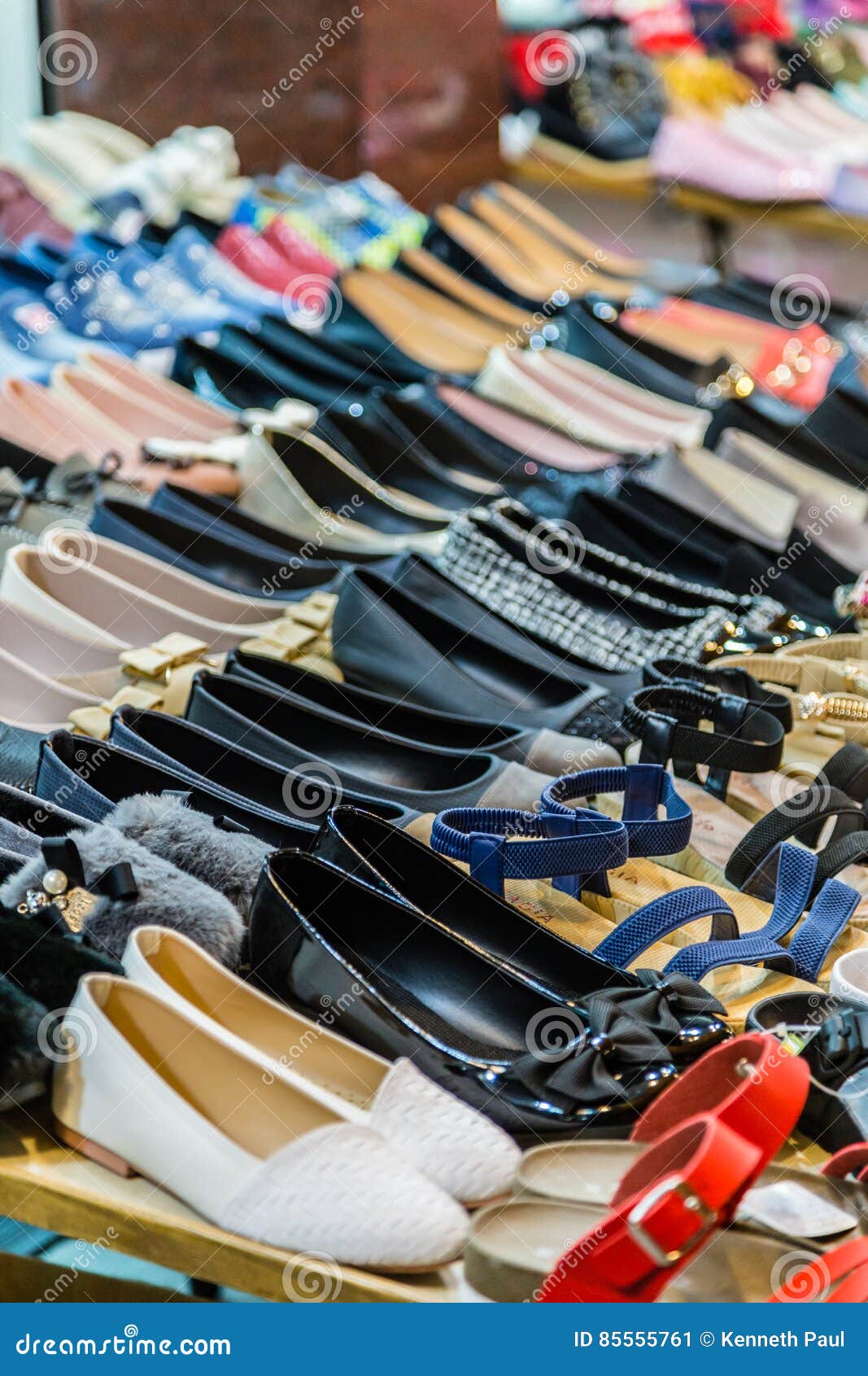 Rows of shoes on a table stock image. Image of casual - 85555761
