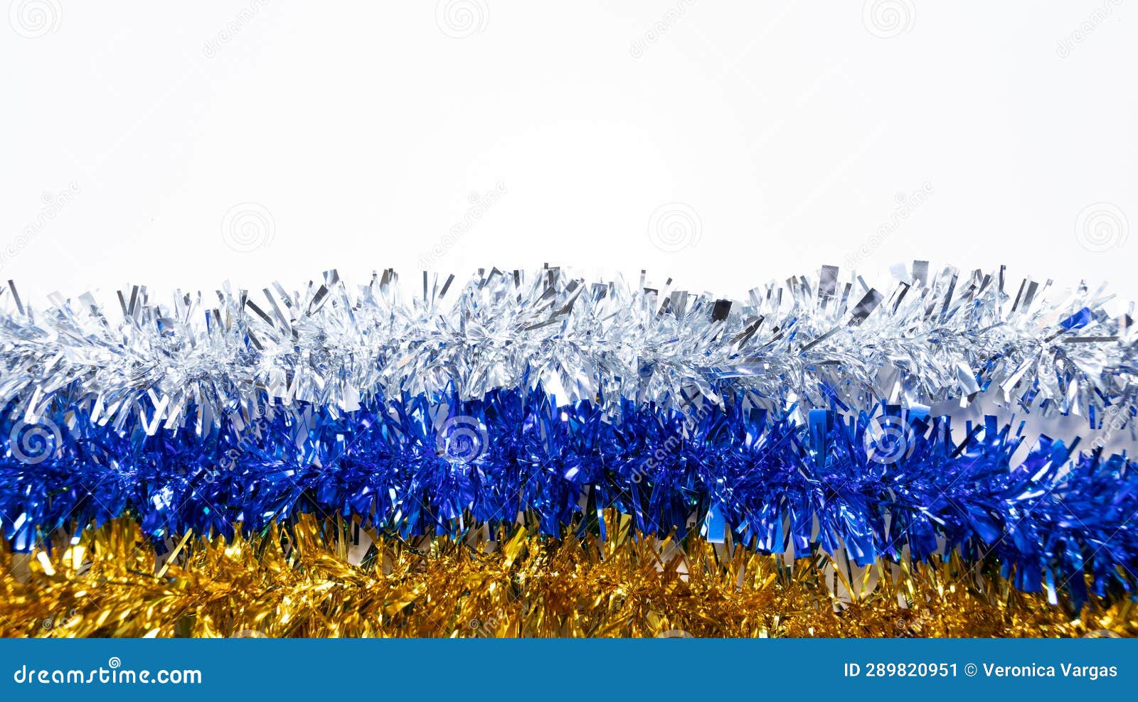 3 Rows of Silver, Blue and Gold Tinsel Stock Image - Image of ornaments ...