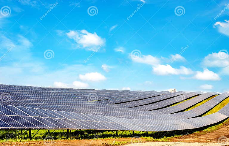 Rows of Solar Panels on the Steep Hills of the Field Stock Photo ...