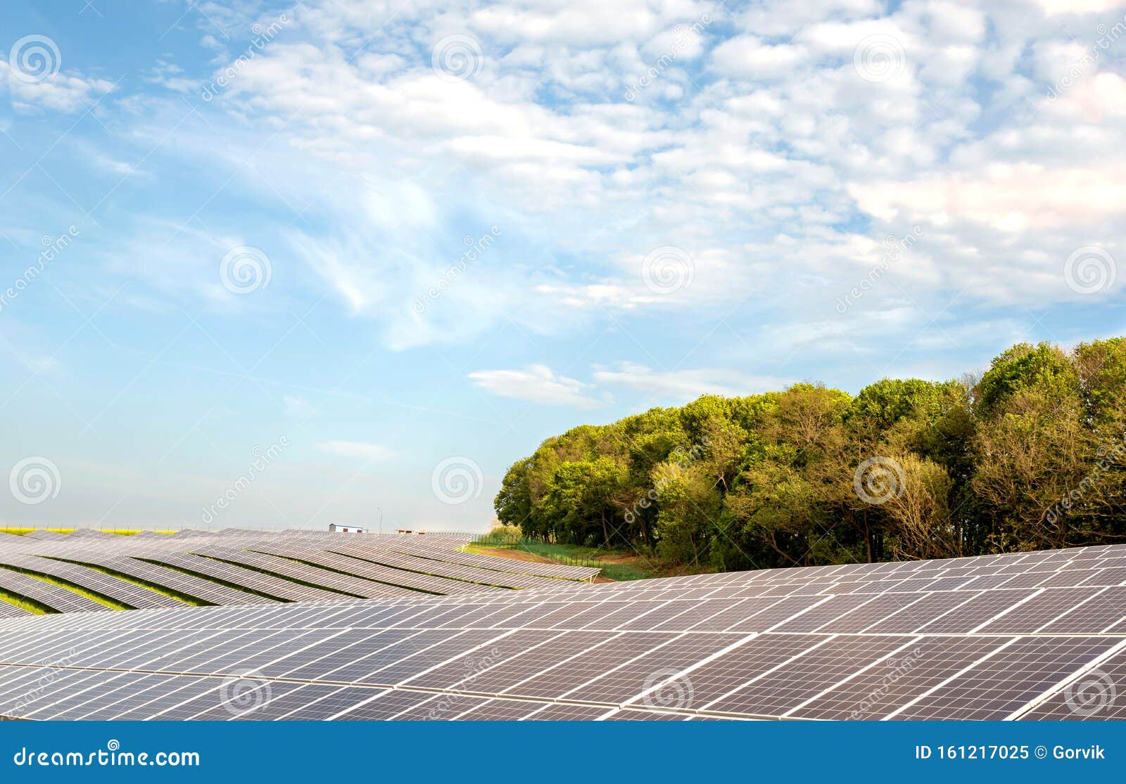 Rows of Solar Panels on the Steep Hills of the Field Stock Image ...