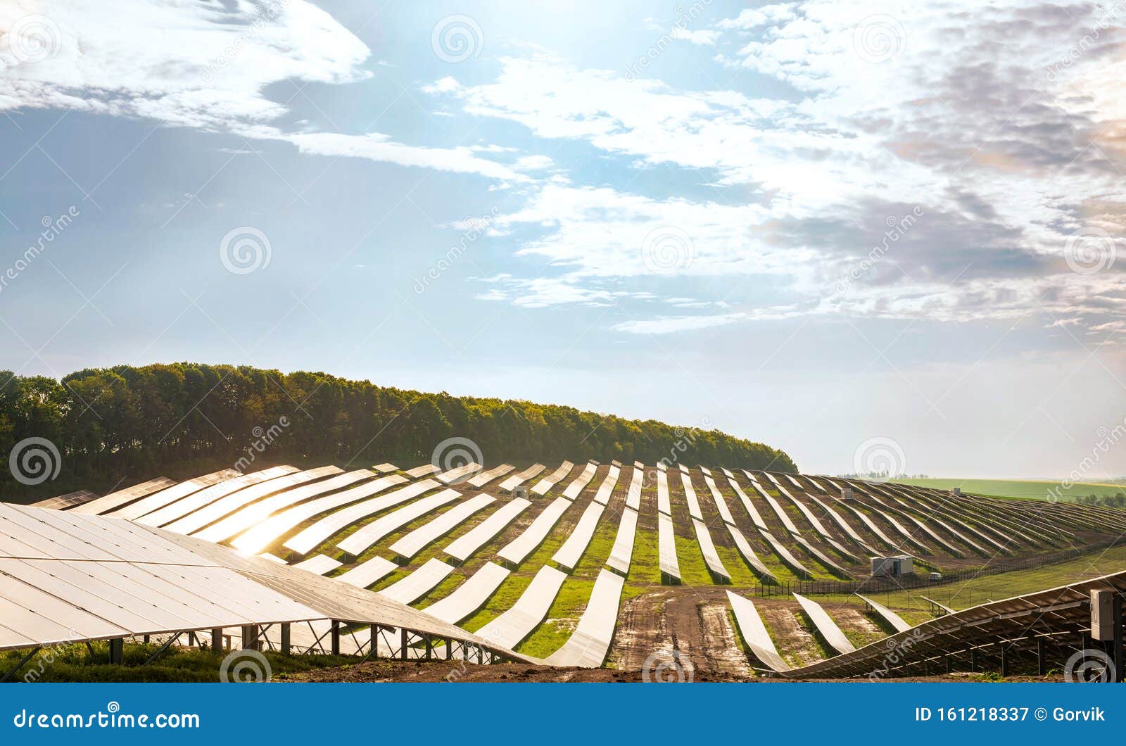 Rows of Solar Panels on the Steep Hills of the Field Stock Image ...