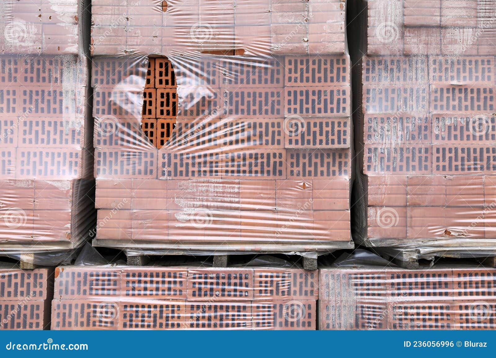 Rows of stacked red bricks stock photo. Image of packing - 236056996