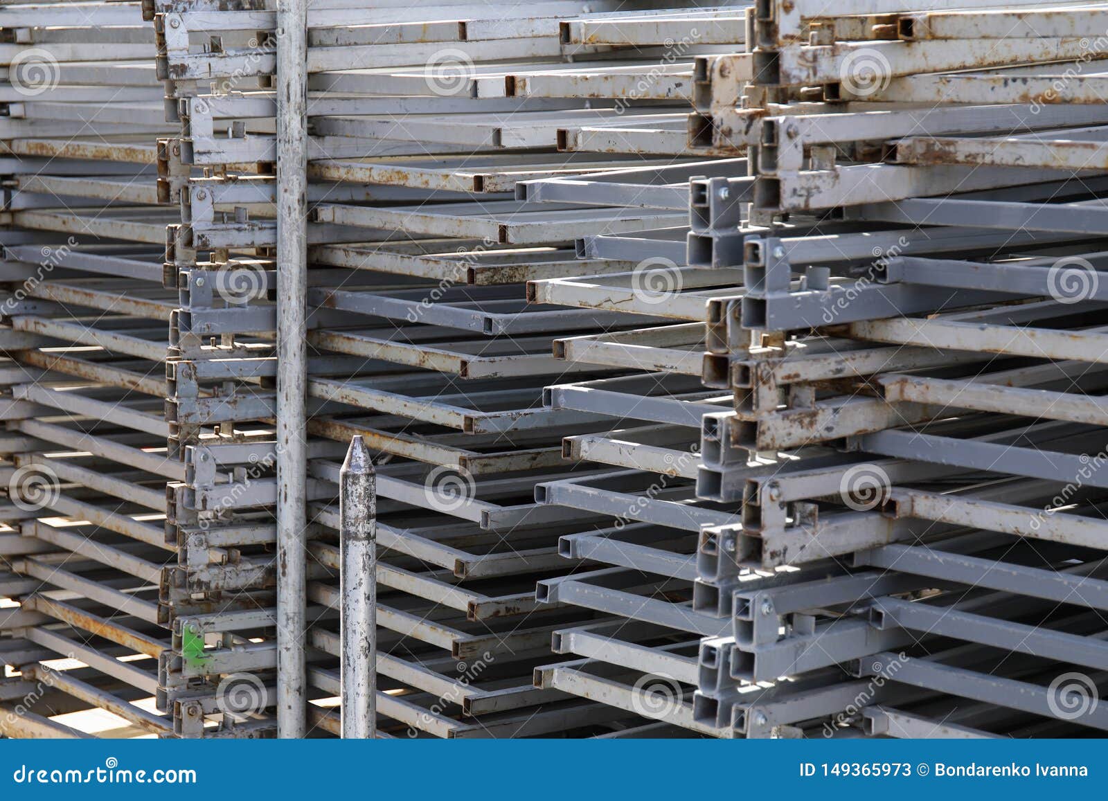 Rows of Steel Bar Storage and Stacking in the Warehouse for Industrial ...