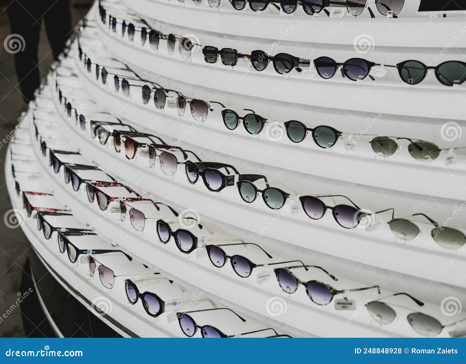 Rows of Sunglasses on the Counter of an Optical Store Stock Photo ...