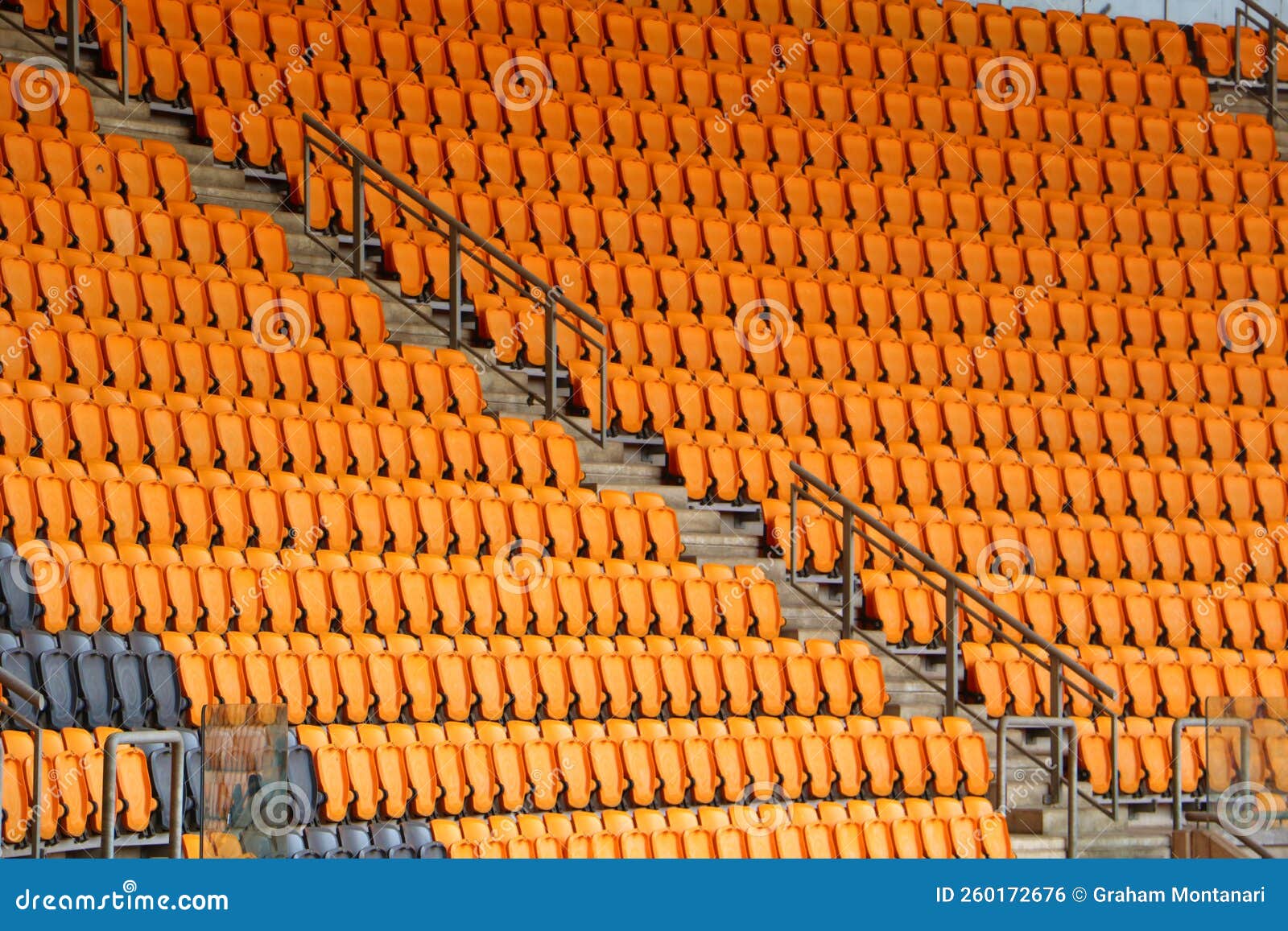 Rows of Vacant Empty Orange Fold Up Seating Stock Photo - Image of rows ...