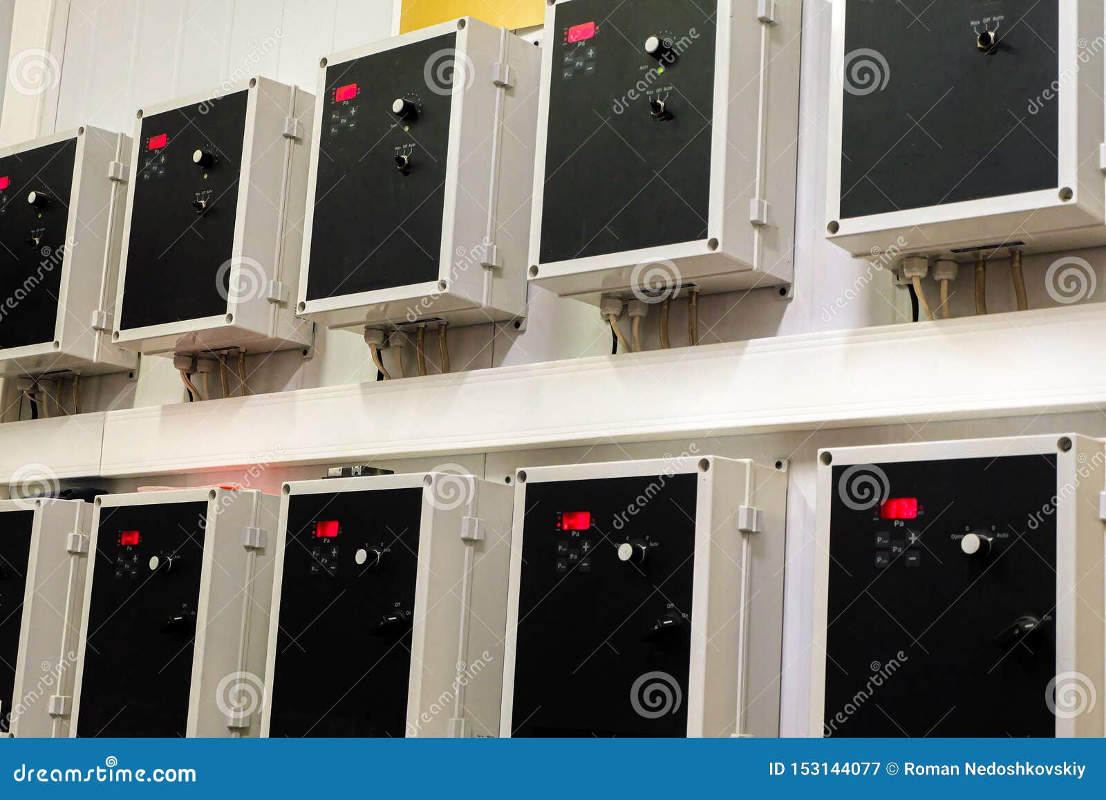 Rows of Wall Cupboards with Industrial Automation Stock Image - Image ...
