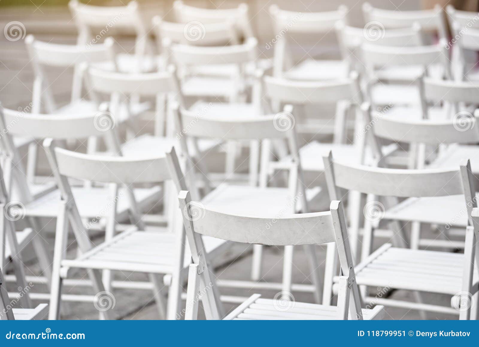 Rows of white chairs stock image. Image of furniture - 118799951