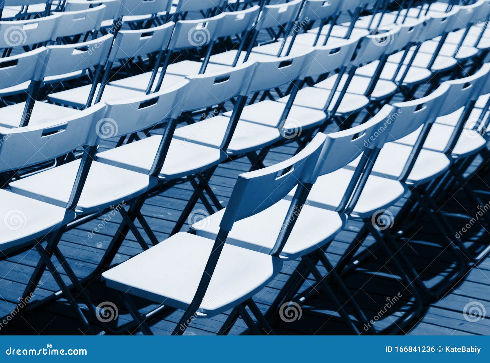 Rows of the white chairs stock photo. Image of foresight - 166841236