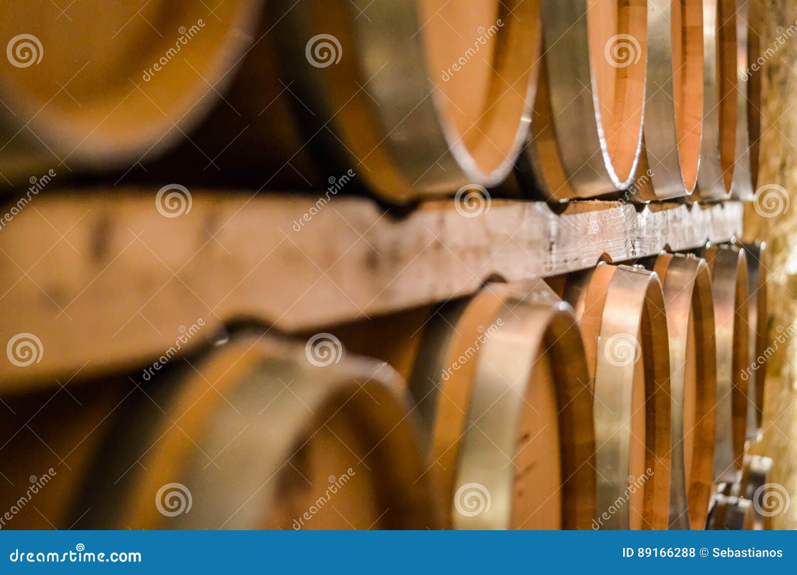 Rows of Wine Barrels Stacked in Winery Stock Photo - Image of closeup ...