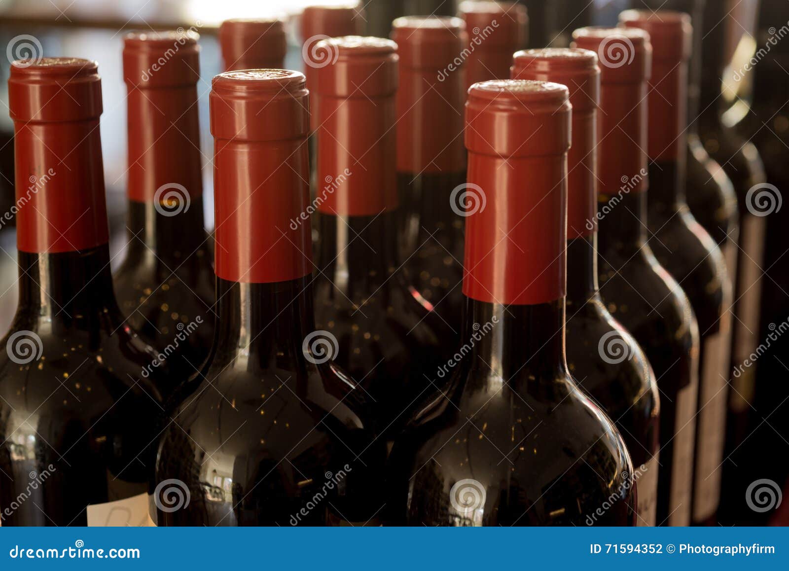 Rows of Wine Bottles Sealed in Red Stock Photo - Image of chardonnay ...