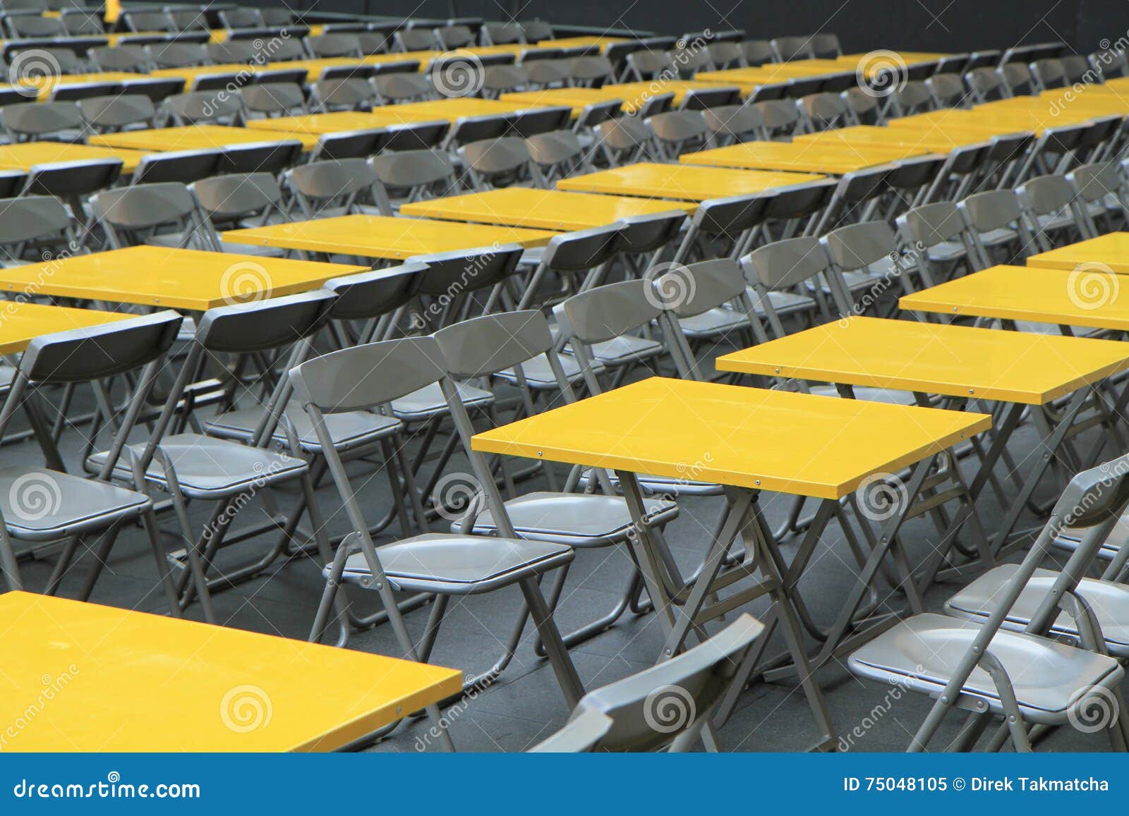Rows of Yellow Metal Tables Stock Image - Image of line, yellow: 75048105
