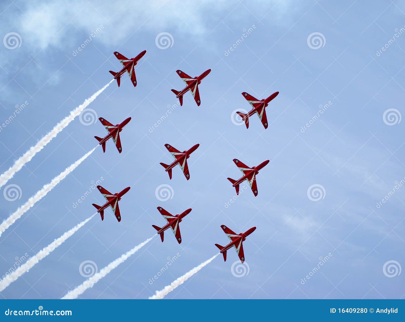 Nine Red Arrows RAF Planes Fly In Formation Giving Off Red White And ...