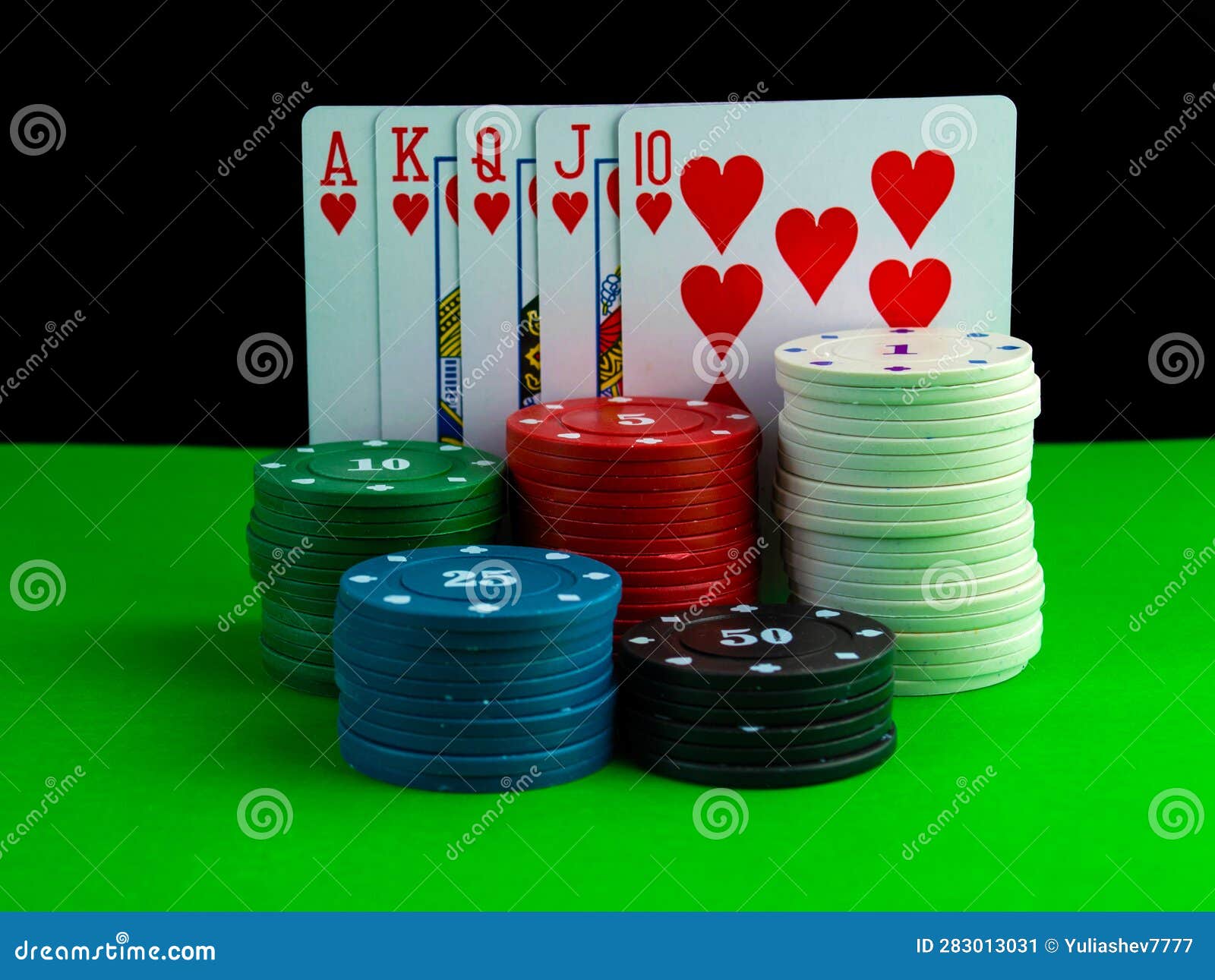 Royal Flush Cards and Poker Chips in Stacks on the Table Stock Image ...