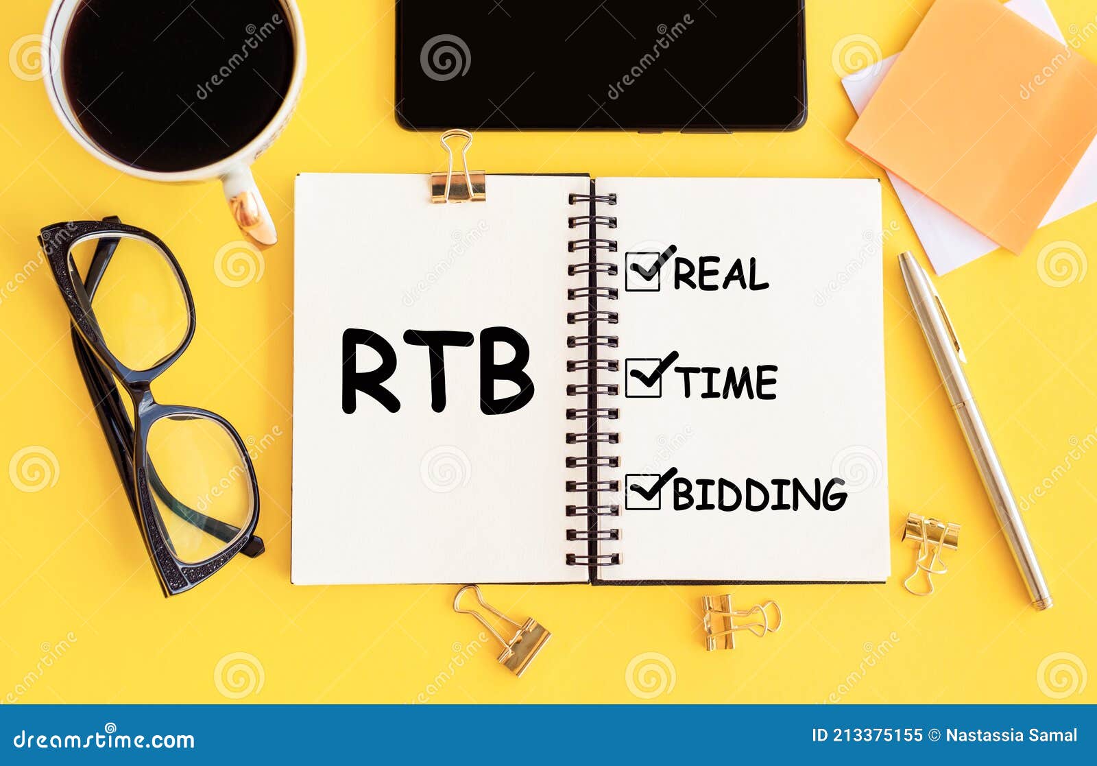 RTB - Real-time Bidding, Text on Notepad and Office Accessories on ...