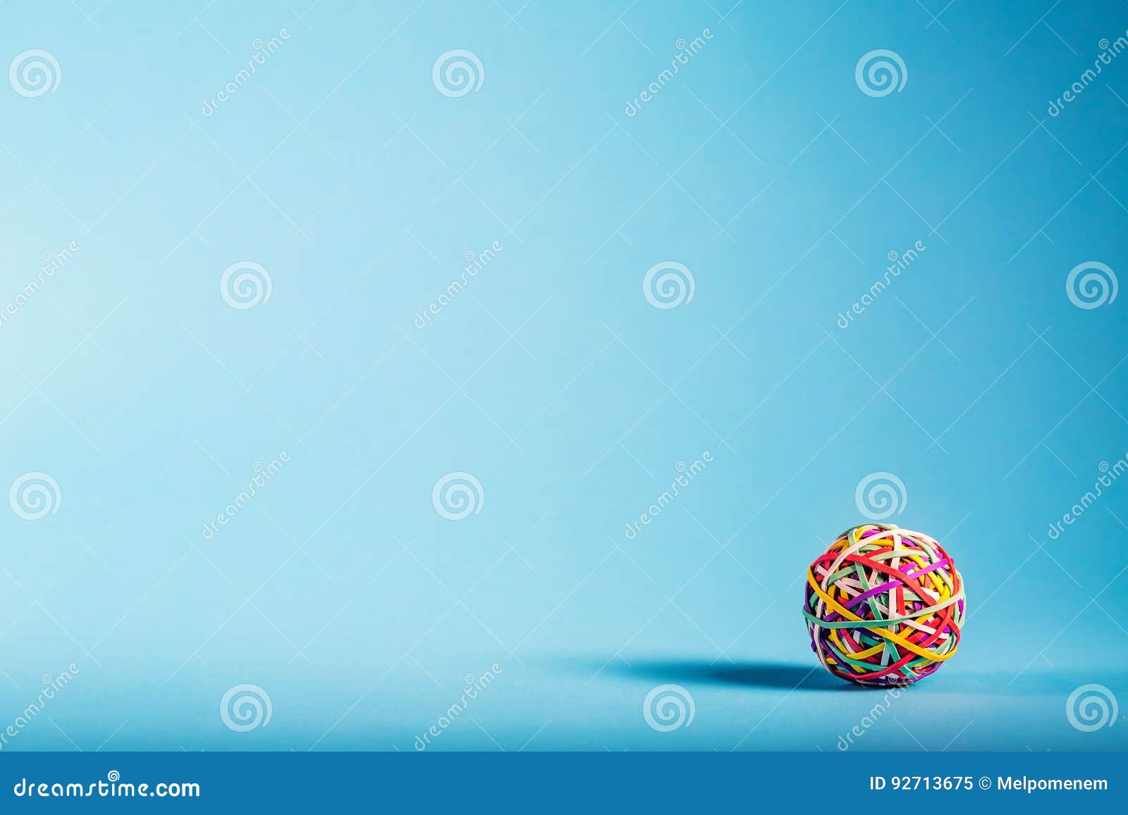 Rubber Band Ball on Blue Background Stock Image - Image of shape, blue ...
