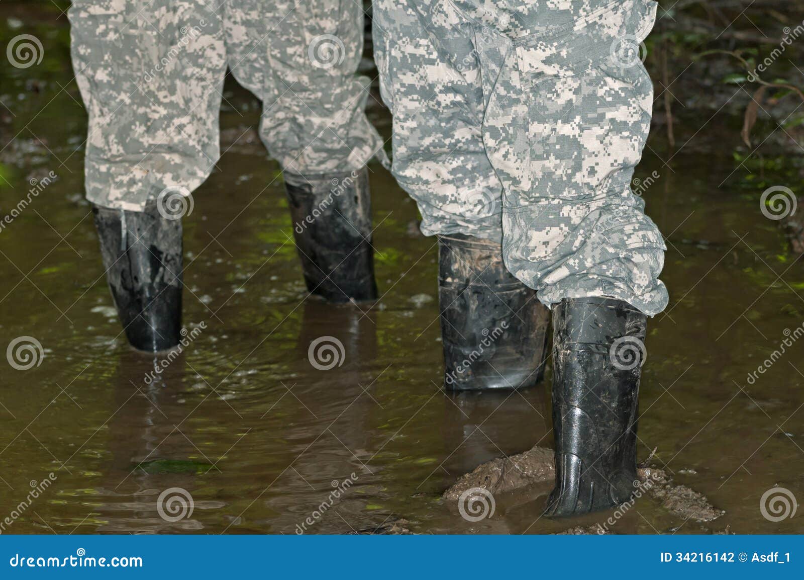 Rubber boots in the mud stock photo. Image of swamp, military - 34216142
