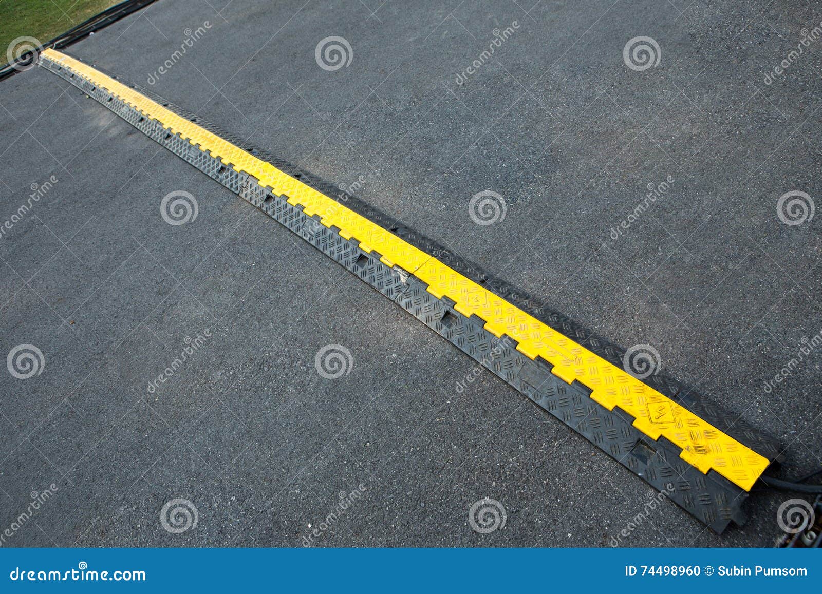 Rubber Cable Protector for Rubber Speed Bump Stock Photo - Image of ...