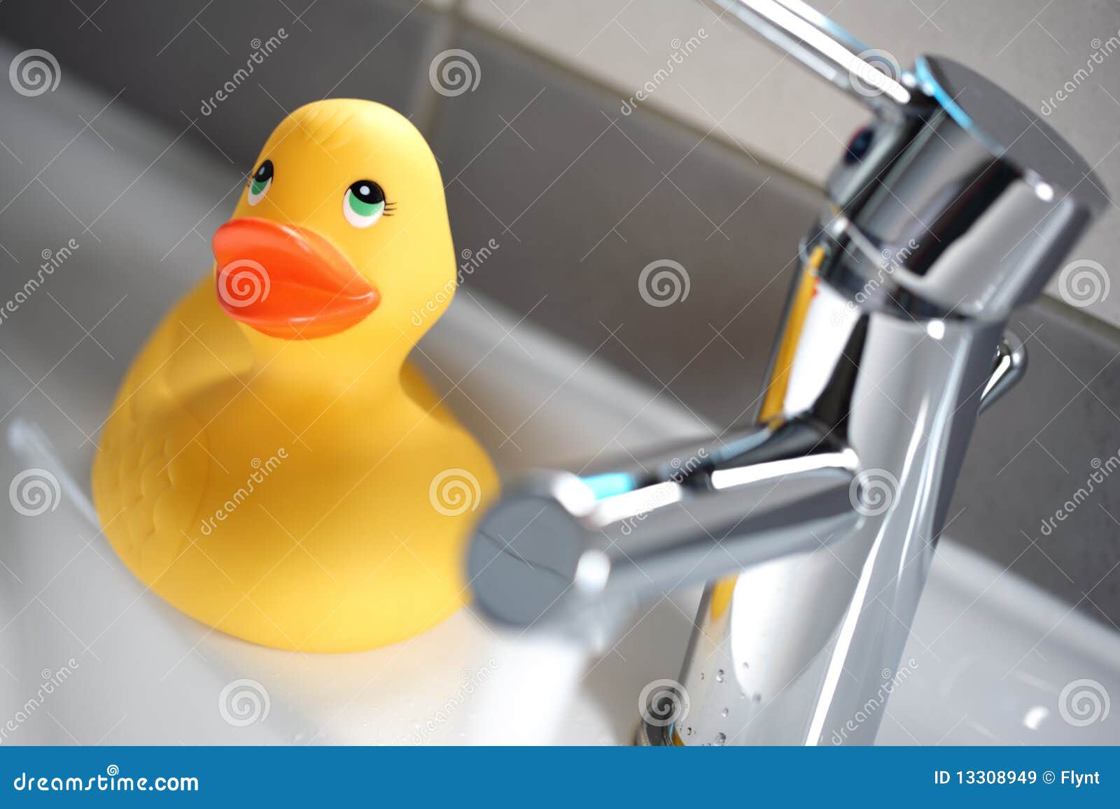 Rubber duck in the bath stock image. Image of smiling - 13308949