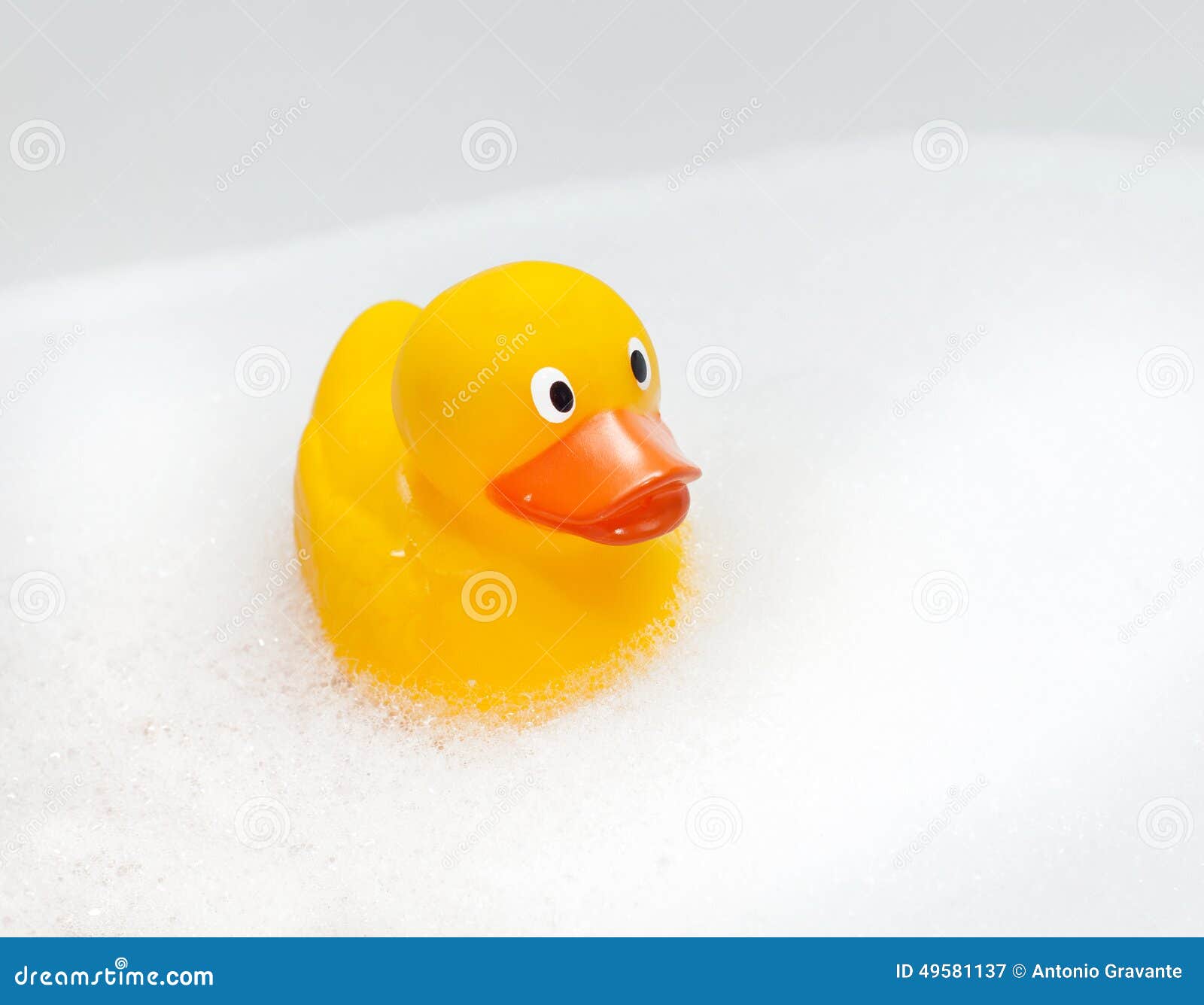 Rubber duck in foam bath stock image. Image of bill, rubber - 49581137