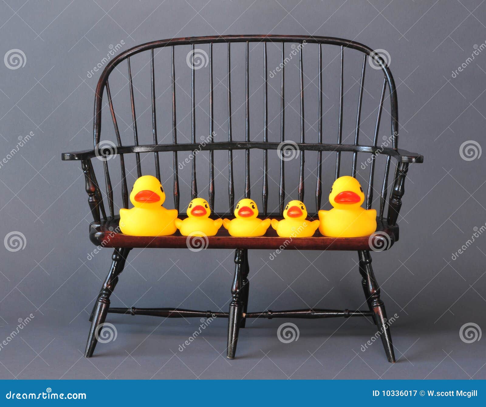 Rubber ducks on chair stock image. Image of family, duckies - 10336017