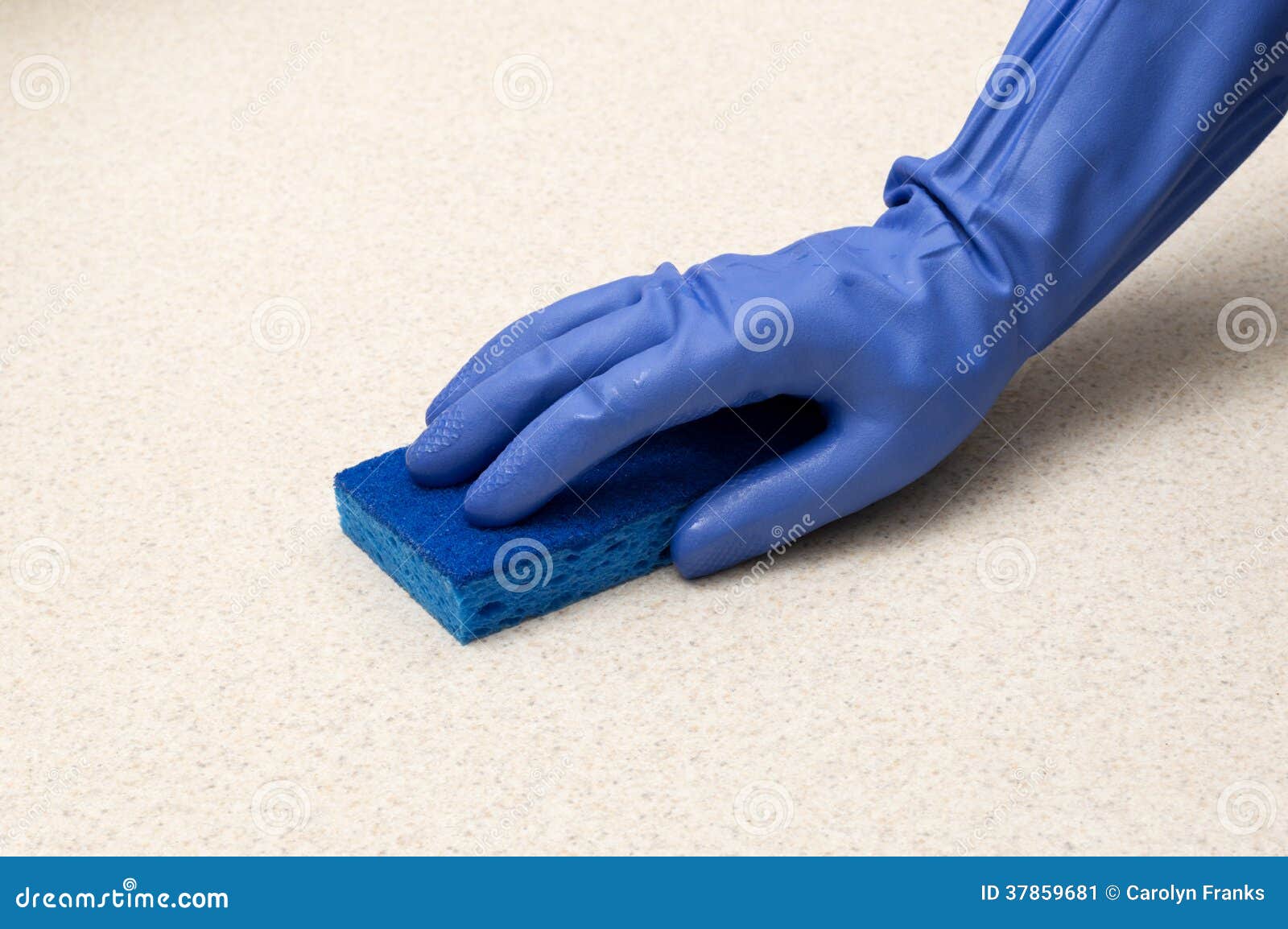Rubber Gloved Hand with Sponge on Counter Stock Image - Image of blue ...