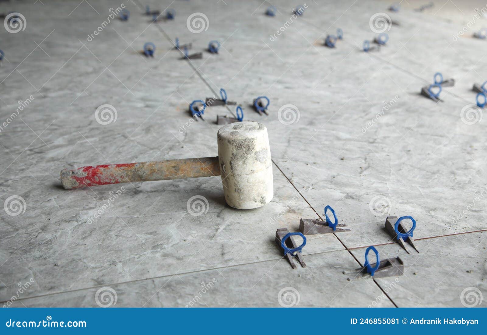 Rubber Hammer on the Tiles. Renovating the Floor Stock Image - Image of ...