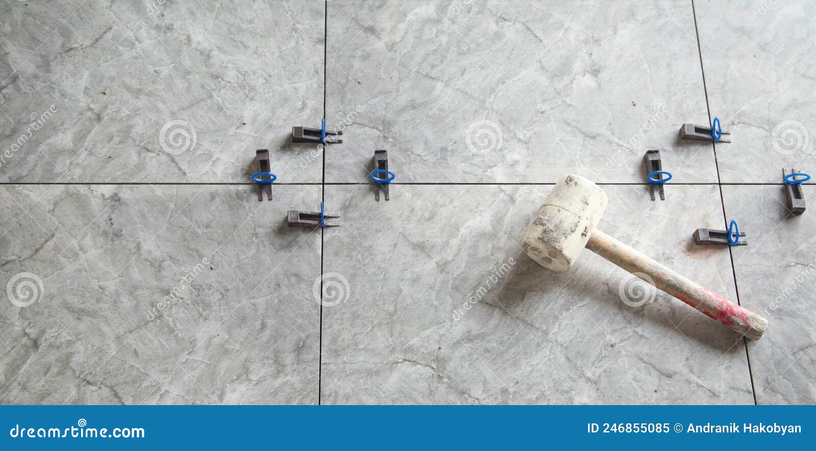 Rubber Hammer on the Tiles. Renovating the Floor Stock Image - Image of ...