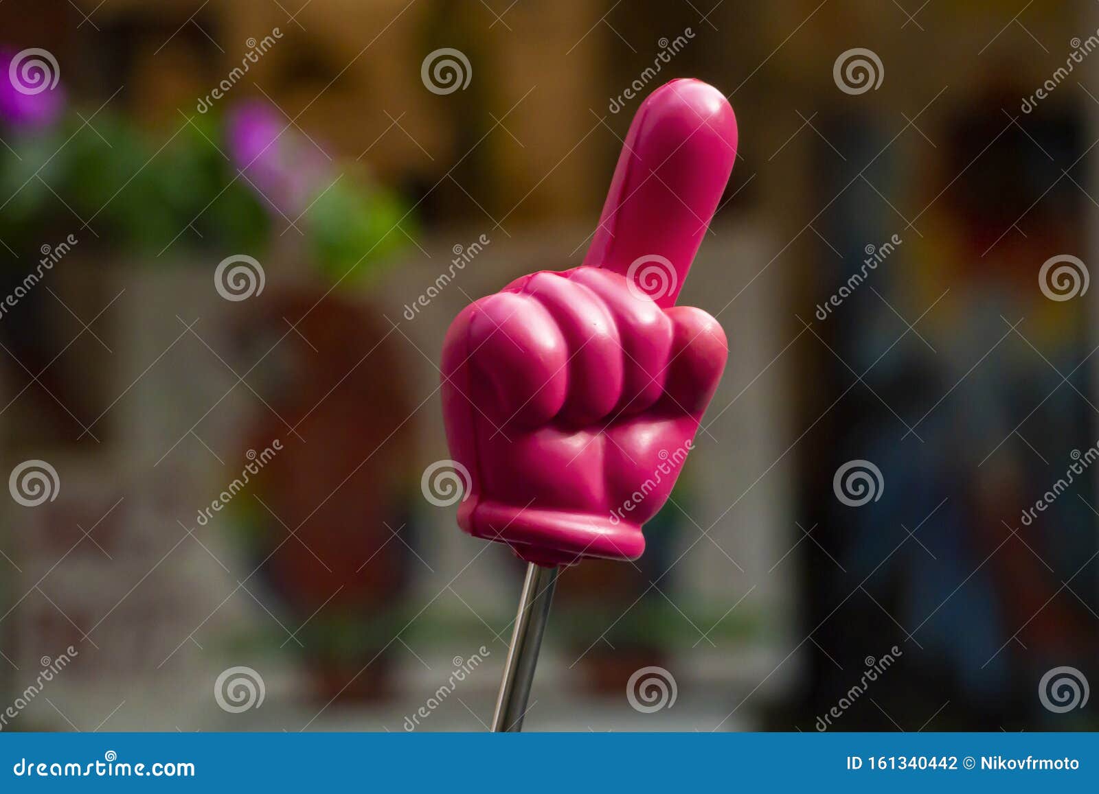 Rubber Hand on a Stick of a Tourist Guide Stock Photo - Image of ...