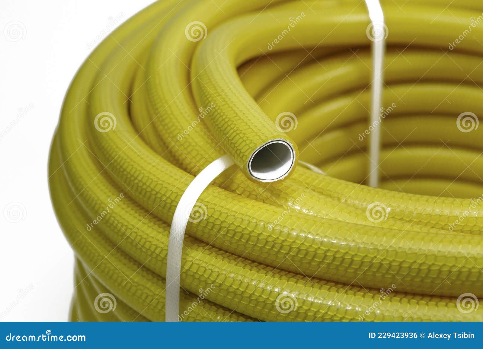 A Rubber Hose Wrapped in a Bobbin and Fastened with a Plastic Lock ...