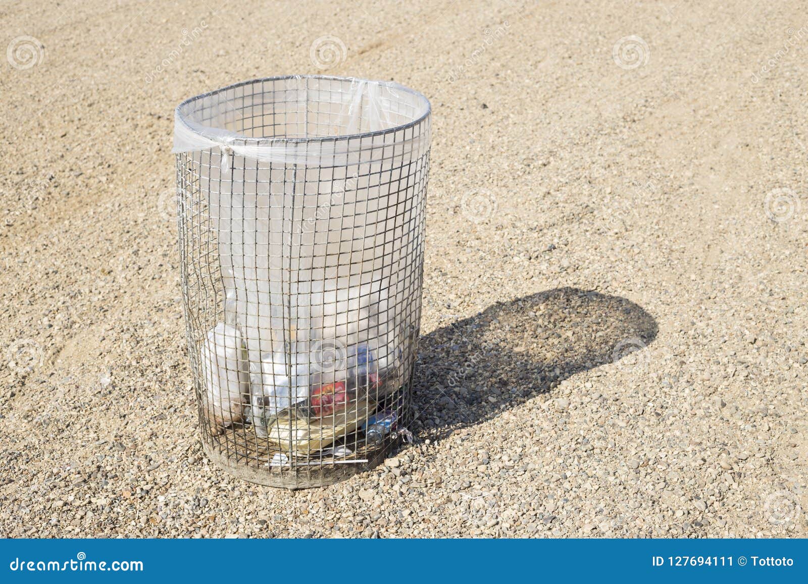 Rubbish bean on the beach stock image. Image of trash - 127694111