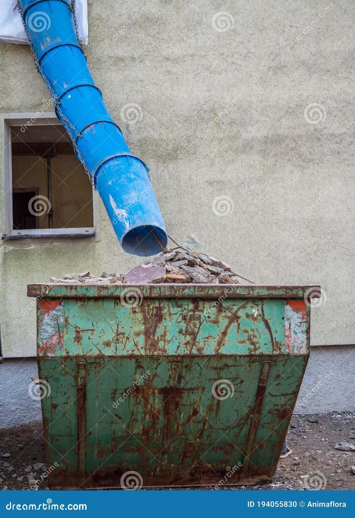 Rubble Chute on a Construction Site with Container Stock Photo - Image ...