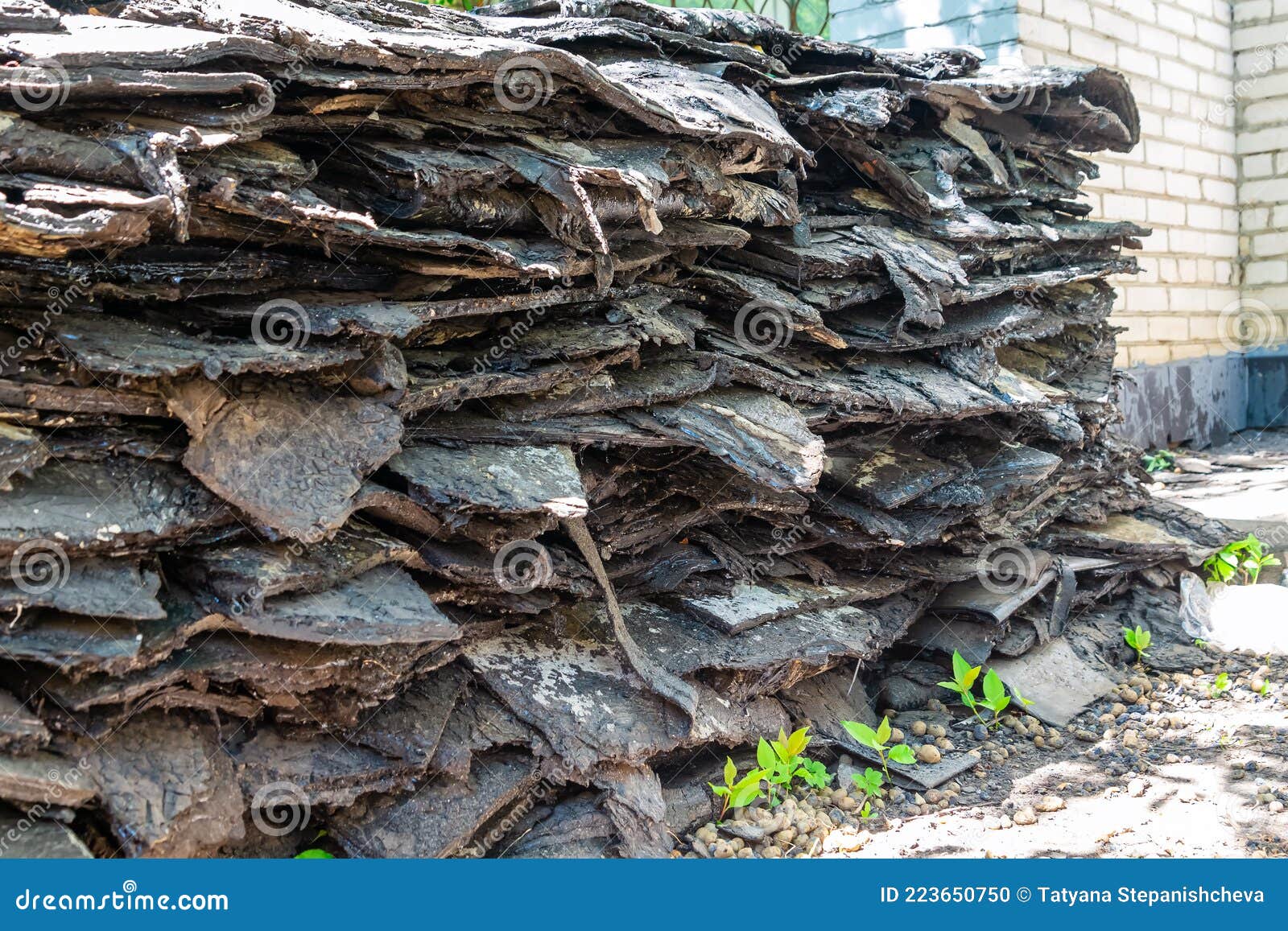 Ruberoyd with a Tar is Sliced into Squares and Stacked in a Stack ...