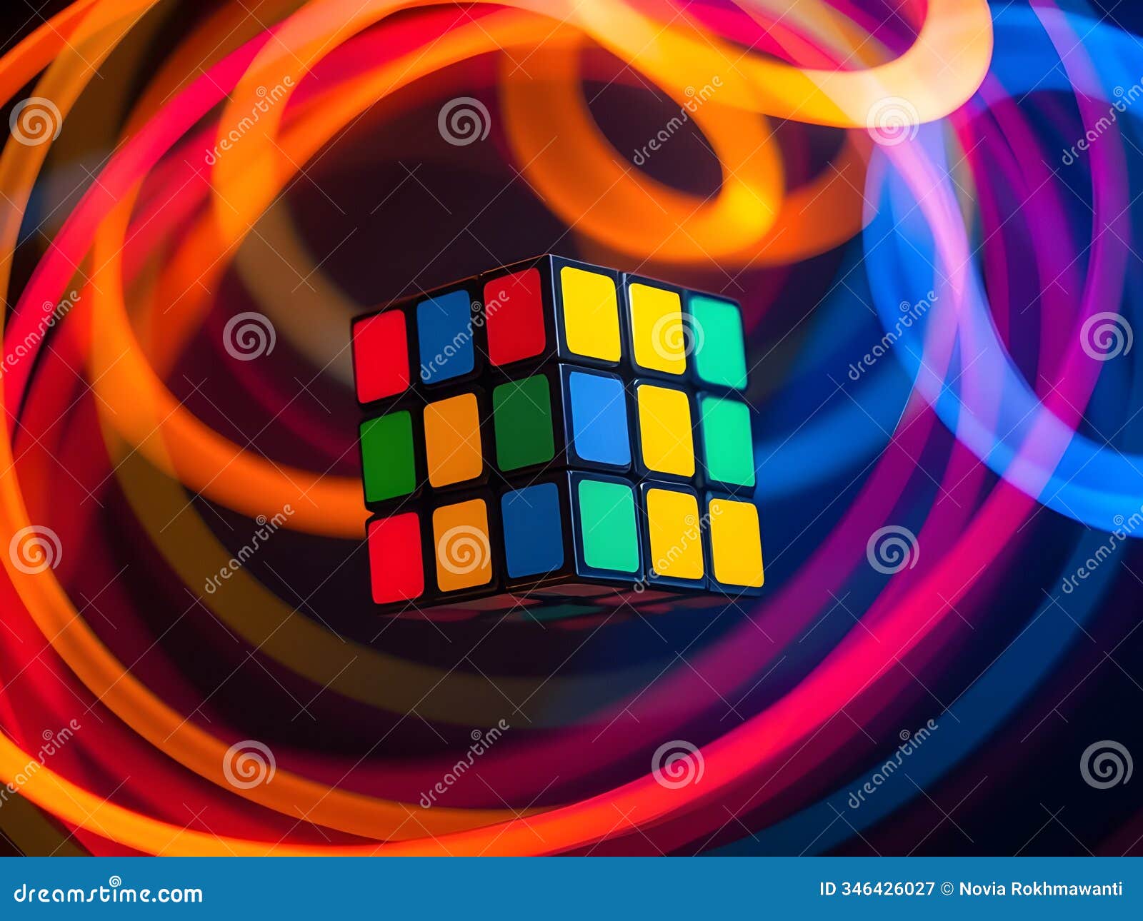 Rubik S Cube Surrounded by Colorful Light Trails Stock Illustration ...