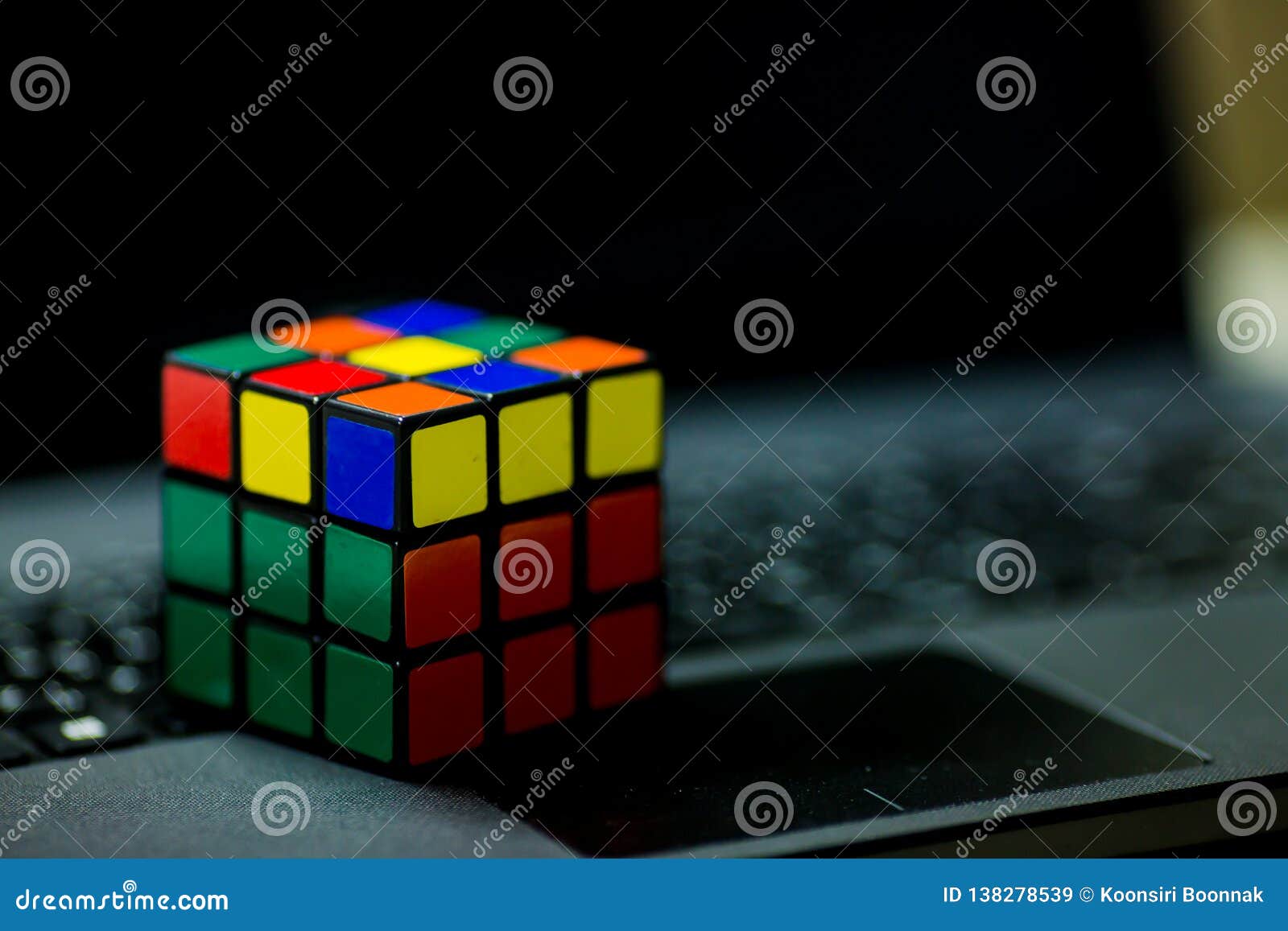 Rubik`s Cube on Laptop. Techincal and Business Solving Problem ...