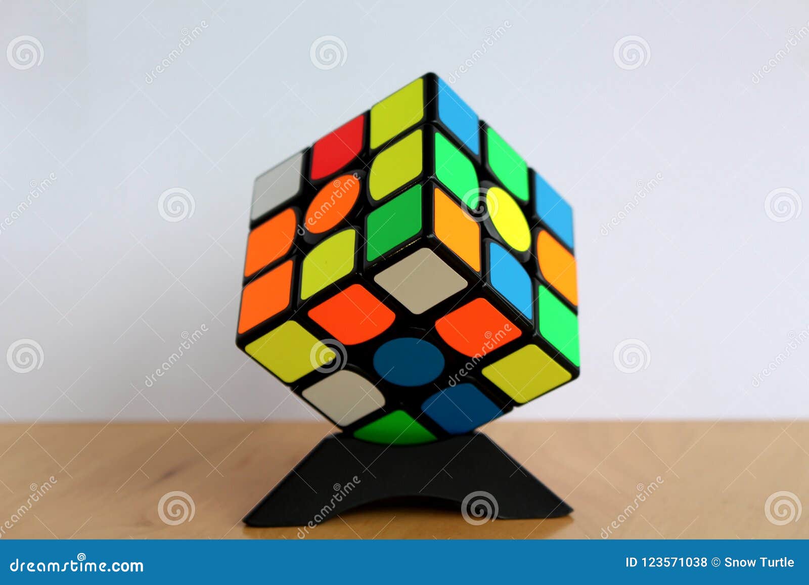 Rubik`s Magic 3x3 Speedcube on a Cube Stand Editorial Stock Photo ...