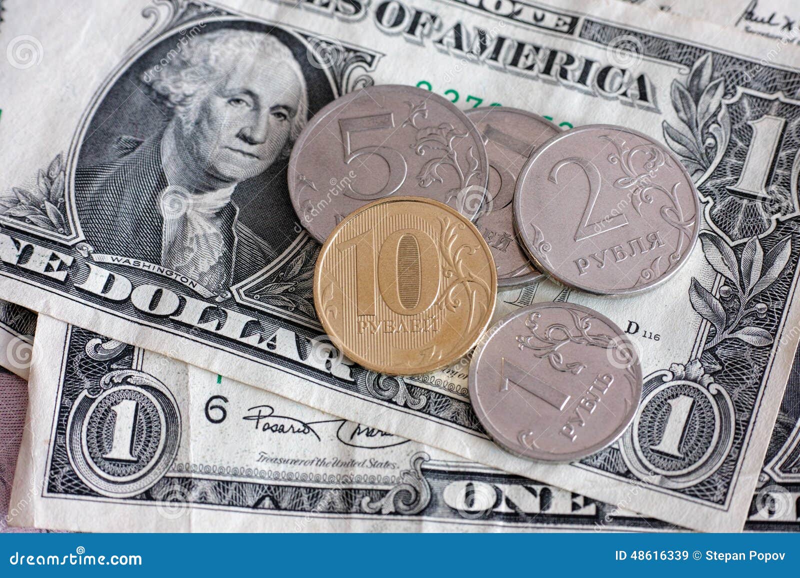 Ruble coins and Dollars stock image. Image of american - 48616339